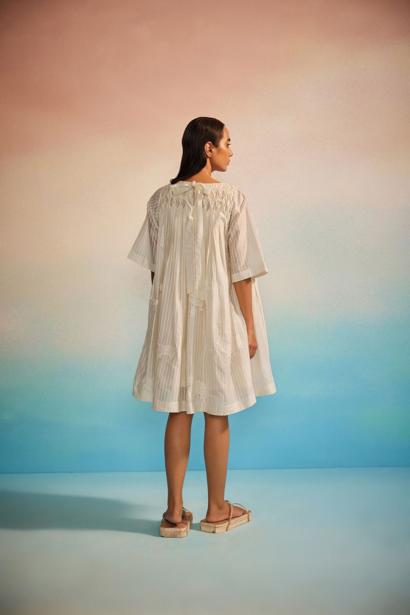 Buy - Musubi ivory smocking dress | Elan Store